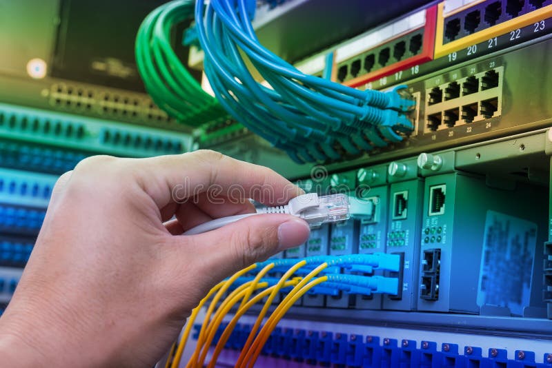 Man Connecting Fiber Network Cables Stock Photo - Image of center ...