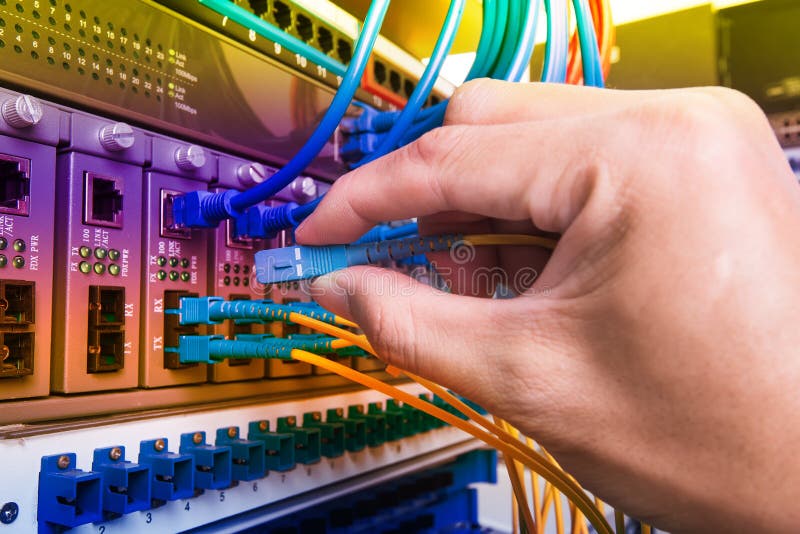Man Connecting Fiber Network Cables Stock Photo - Image of center ...
