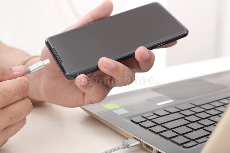 Man is Connecting Laptop To Phone Stock Image - Image of isolated ...