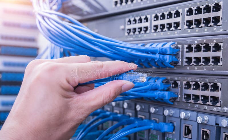Connecting a network plug stock image. Image of horizontal - 10542021