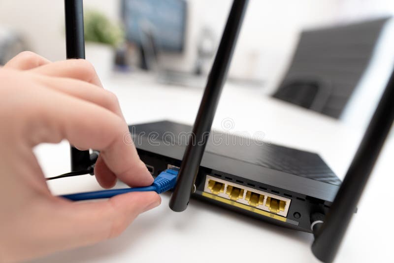 Man Connects the Internet Cable To the Router Stock Image - Image of ...