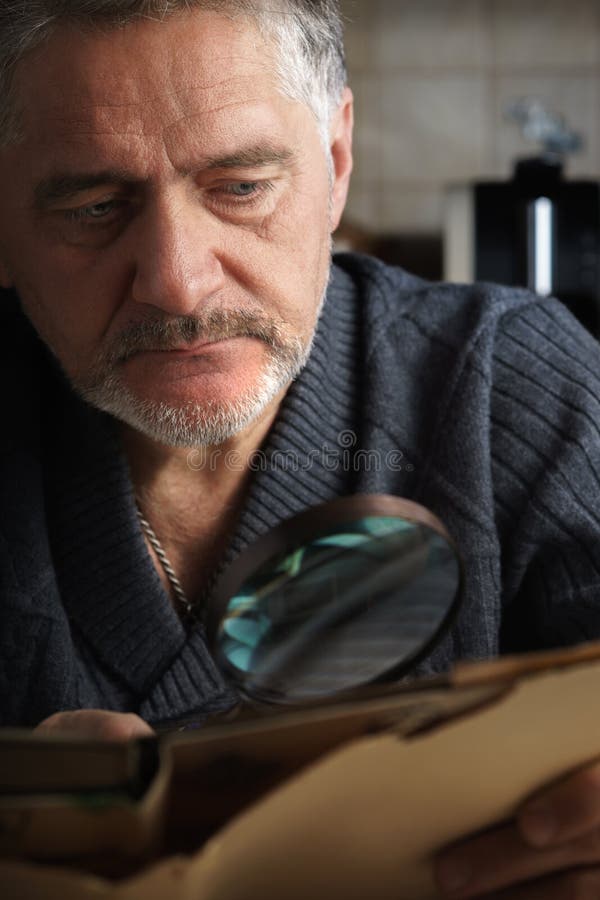 Man Consider Something Trough Magnifying Glass Stock Photos - Free ...