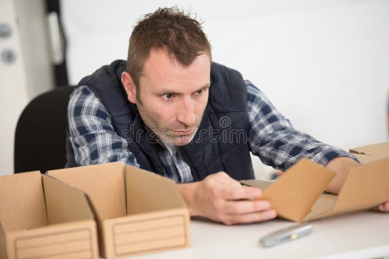 Man Constructing Cardboard Box Stock Image - Image of packaging ...