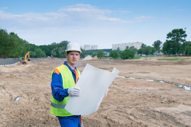 Man on Construction Site Looks at a Building Project Stock Image ...