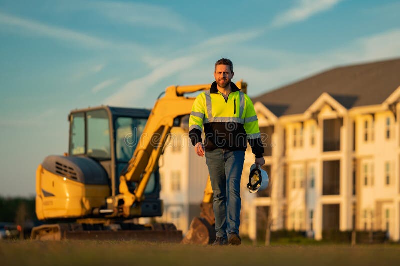 Man at Construction Site. Worker Constructor in Hardhat. Construction ...