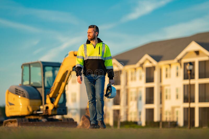 Man at Construction Site. Worker Constructor in Hardhat. Construction ...