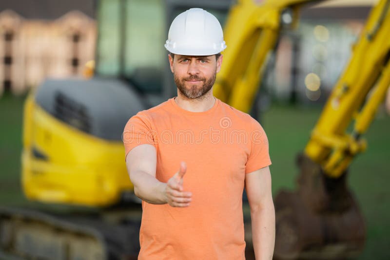 Man at Construction Site. Worker Constructor in Hardhat. Construction ...