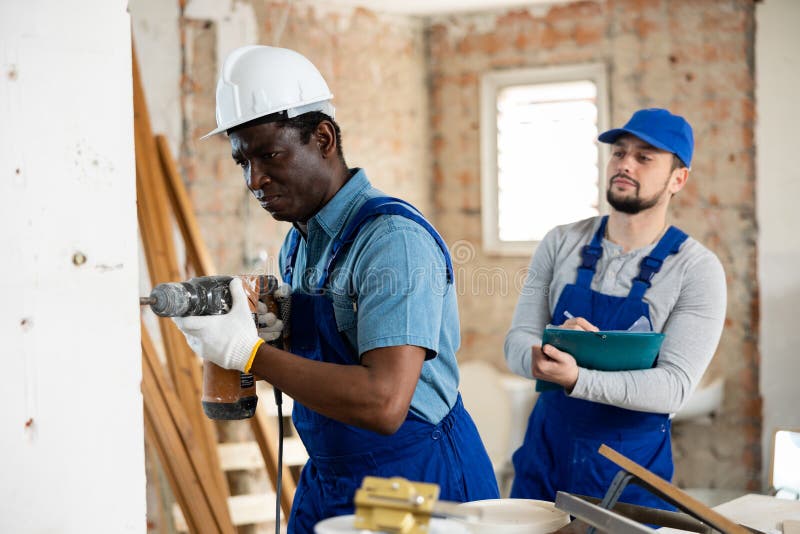 Man Construction Worker Using Demolition Hammer in Apartment Stock ...