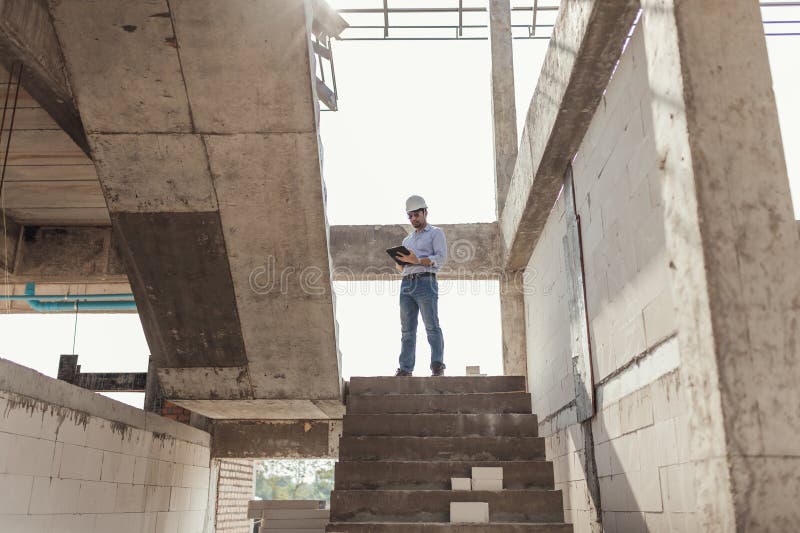 A Man Consult Engineer Inspection Stair in Construction Project Stock ...