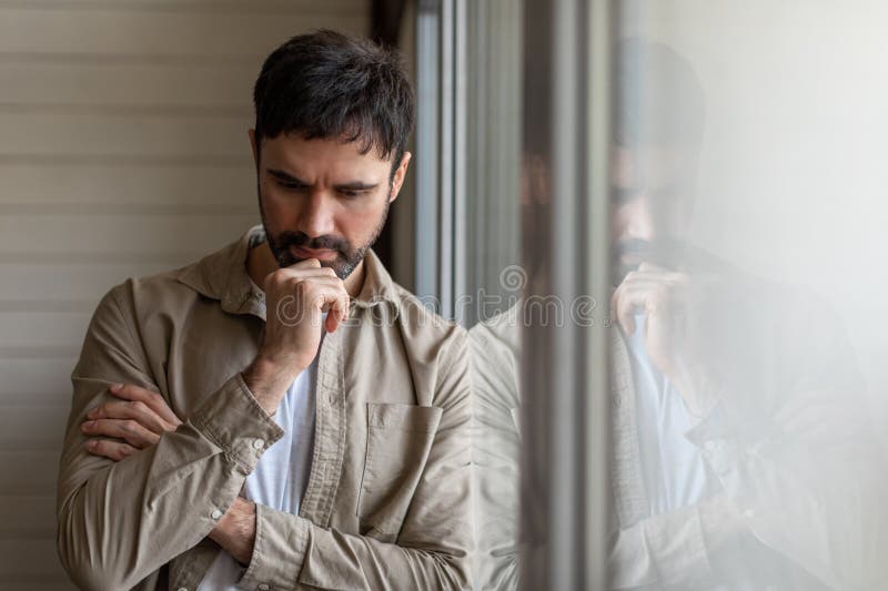Man Contemplating, Standing in Front of Window Stock Photo - Image of ...