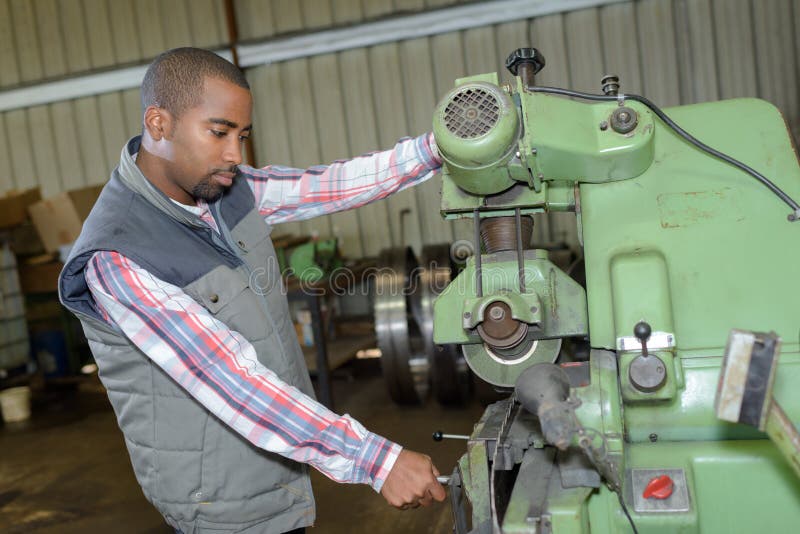 Man on controller machine stock image. Image of technical - 204736555