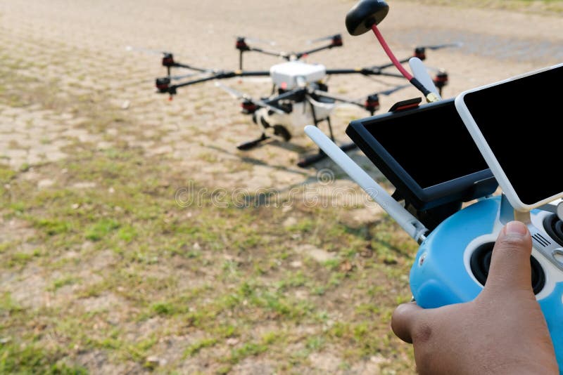 Man Controlling Agriculture Drone. Remote Controller Stock Image ...