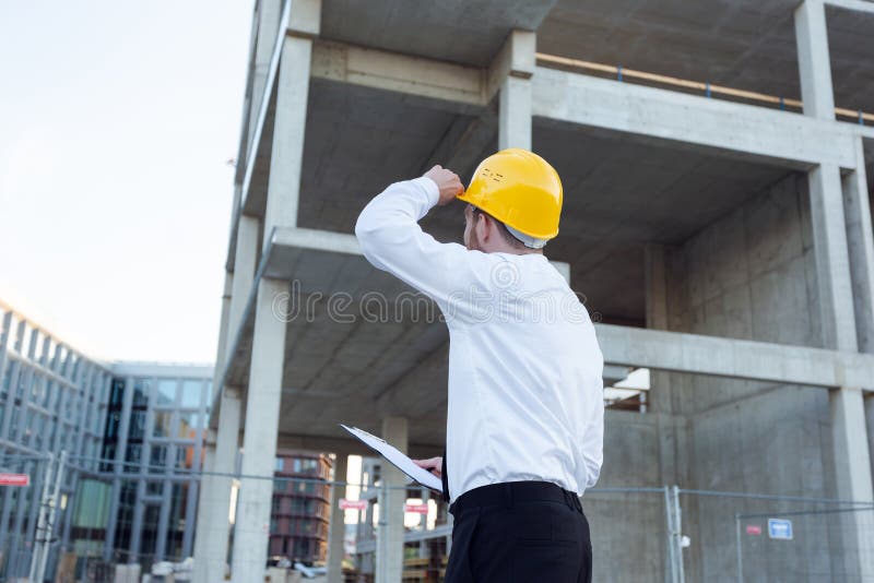 Man Controlling Building. Builder Making Marks in Clipboard Stock Image ...