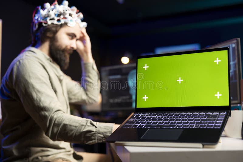 Man Controlling Computer Functions Using Mind, Helped by Mockup ...