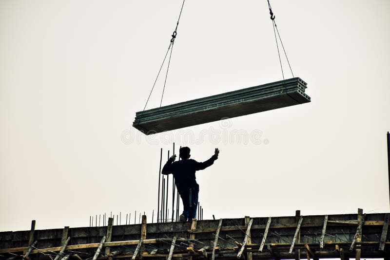 The Man are Controlling Crane in Construction. Editorial Photo - Image ...