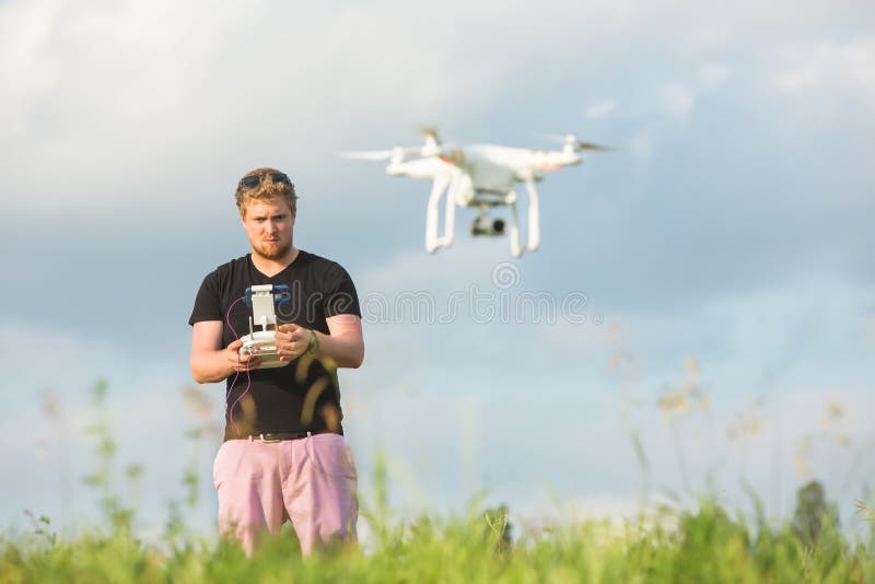 Man Controlling a Drone stock photo. Image of controlling - 61182770