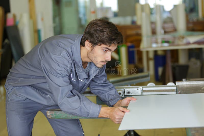 Man Controlling Hydraulic Press Machine for Cutting Steel Stock Image ...