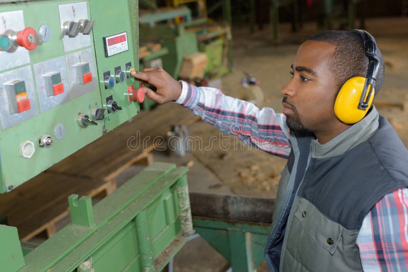 Man Controlling Industrial Machine Stock Image - Image of production ...