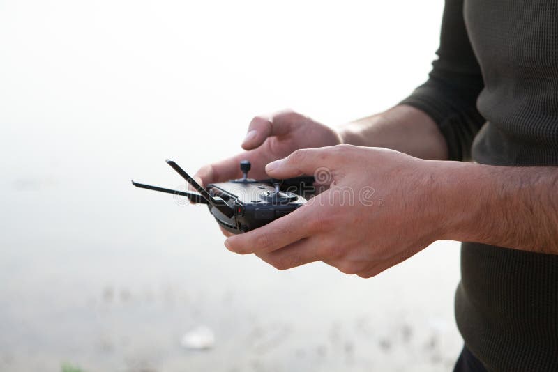 A Man Controls the Drone`s Remote Control Stock Photo - Image of ...