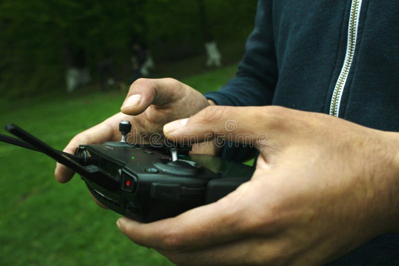A Man Controls the Drone`s Remote Control Stock Photo - Image of ...