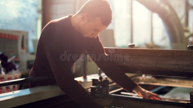Man Controls Wide Industrial Printer in Workshop Stock Photo - Image of ...
