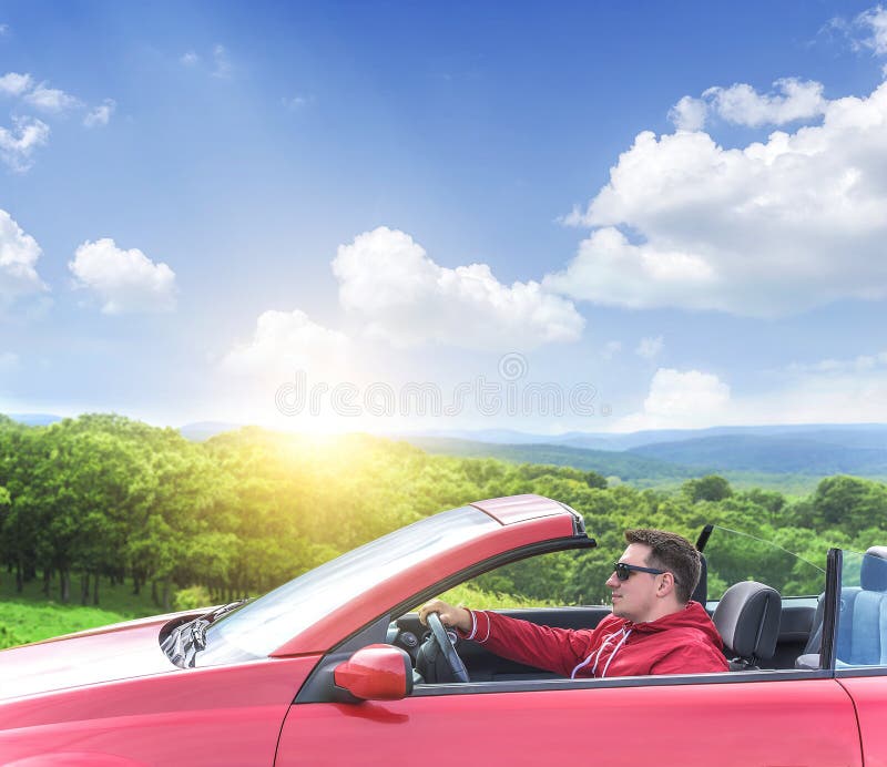 Man in convertible car. stock image. Image of motorway - 73816915