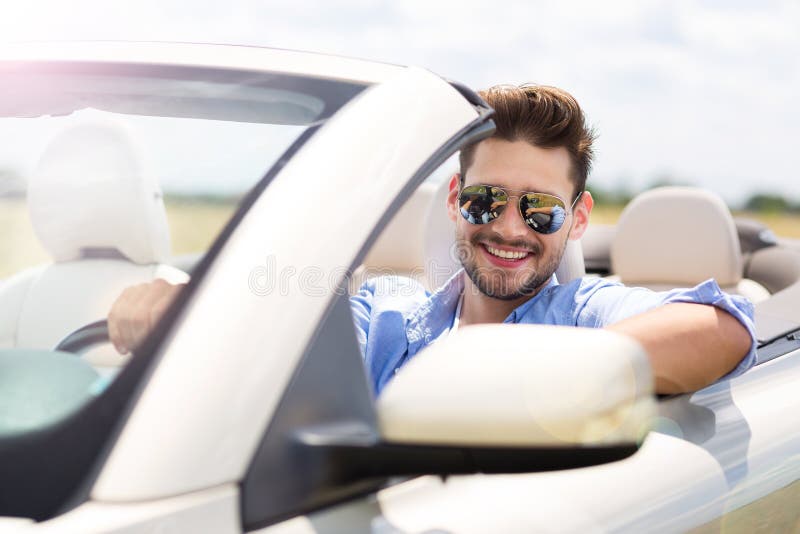 Man in convertible stock photo. Image of twenties, road - 74683544