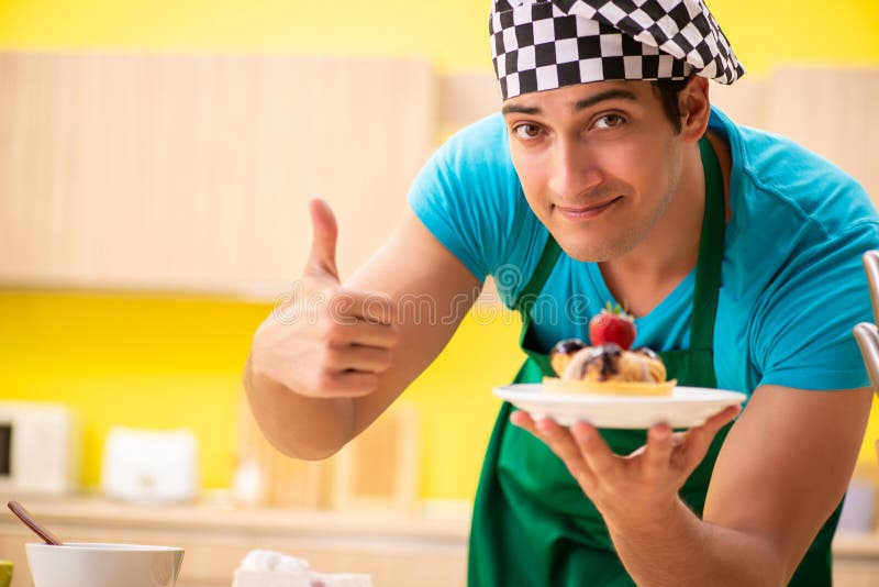 The Man Cook Preparing Cake in Kitchen at Home Stock Photo - Image of ...