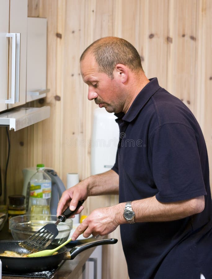 Man cooking stock image. Image of prepares, cooks, heats - 10102313
