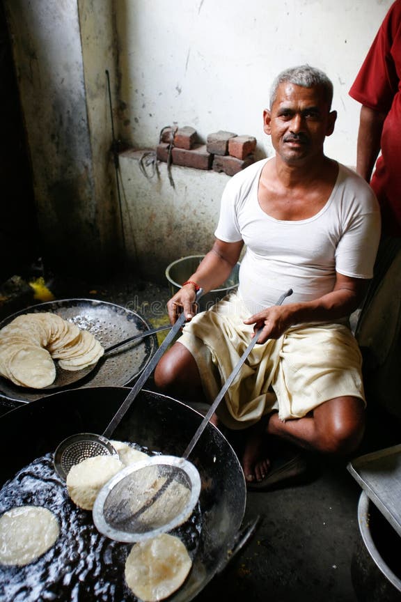 Man cooking editorial photo. Image of food, person, roti - 13244601