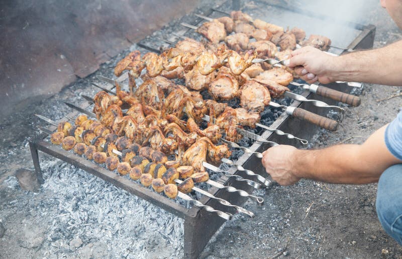 Man Cooking Barbecue Meat in Outdoors Stock Photo - Image of eating ...