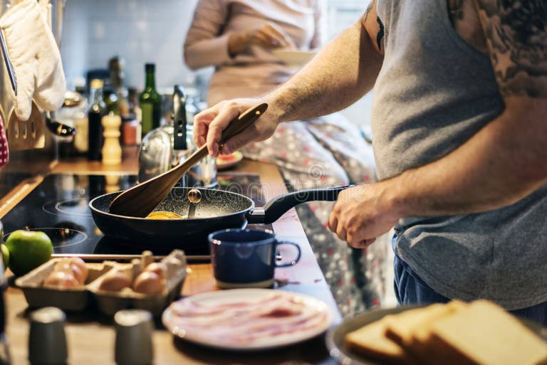 Man Cooking Breakfast in the Kitchen Stock Image - Image of precious ...