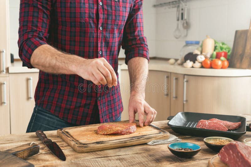 Man Cooking Grilled Steak on the Home Kitchen Stock Image - Image of ...