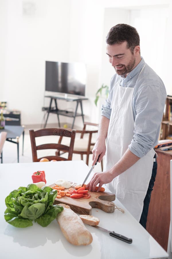 Man Cooking at Home and Preparing Food Stock Image - Image of family ...