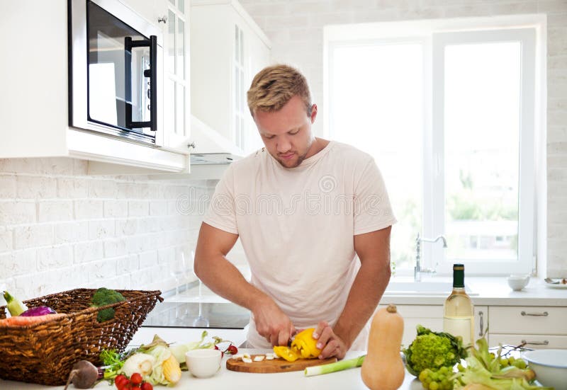 Man Cooking at Home Preparing Salad in Kitchen Stock Image - Image of ...