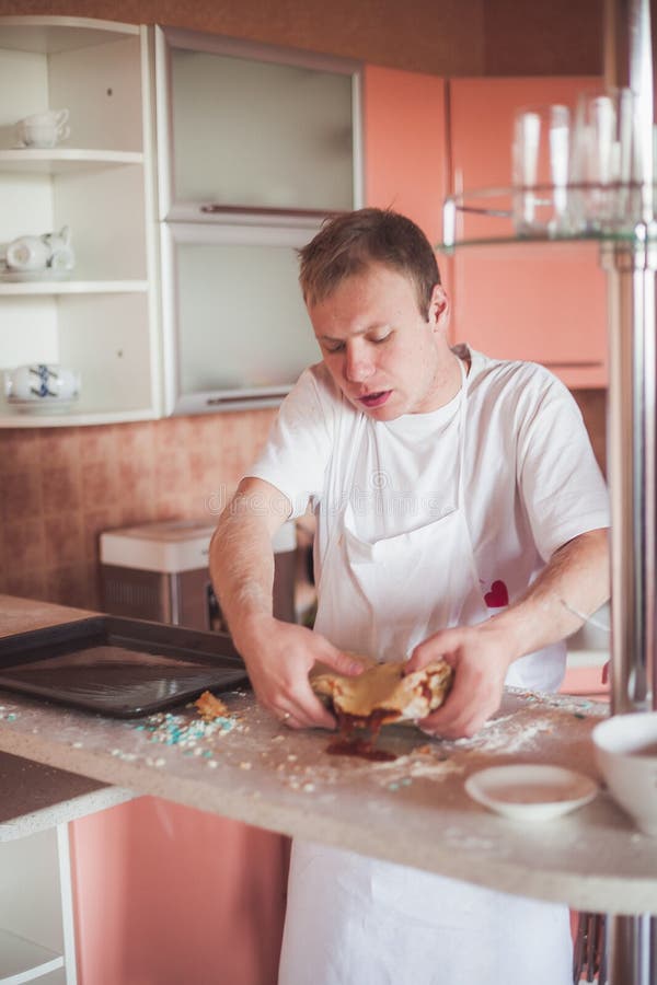 Man cooking at kitchen stock photo. Image of cute, playing - 49896342