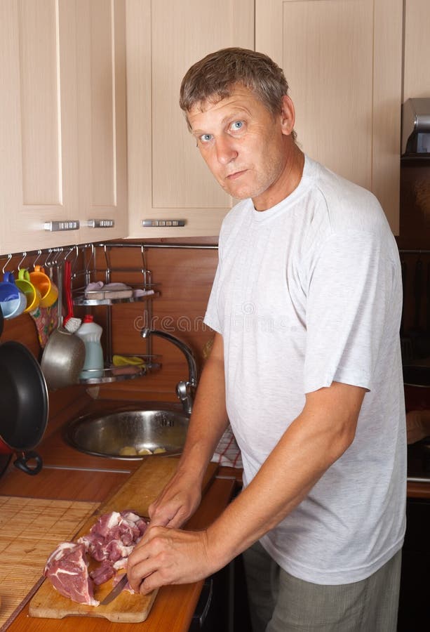 Man cooking meat stock image. Image of pork, culinary - 21156853