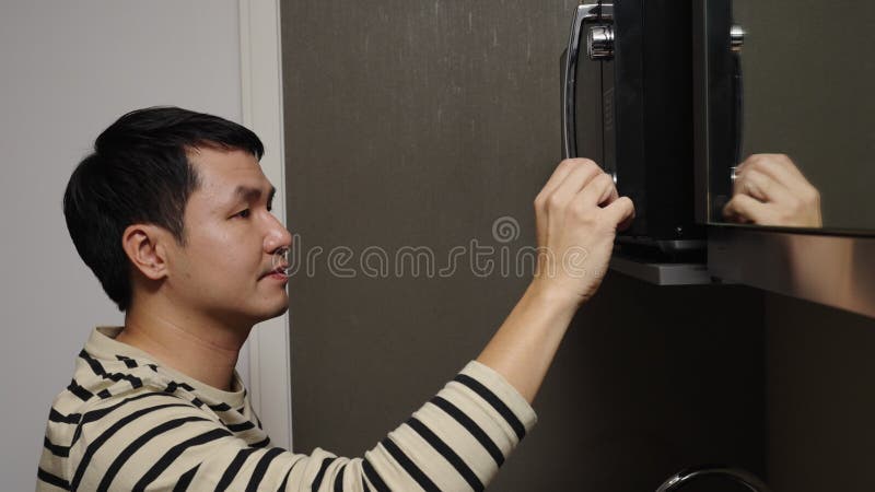 Man Cooking with a Microwave in Kitchen Room Stock Footage - Video of ...