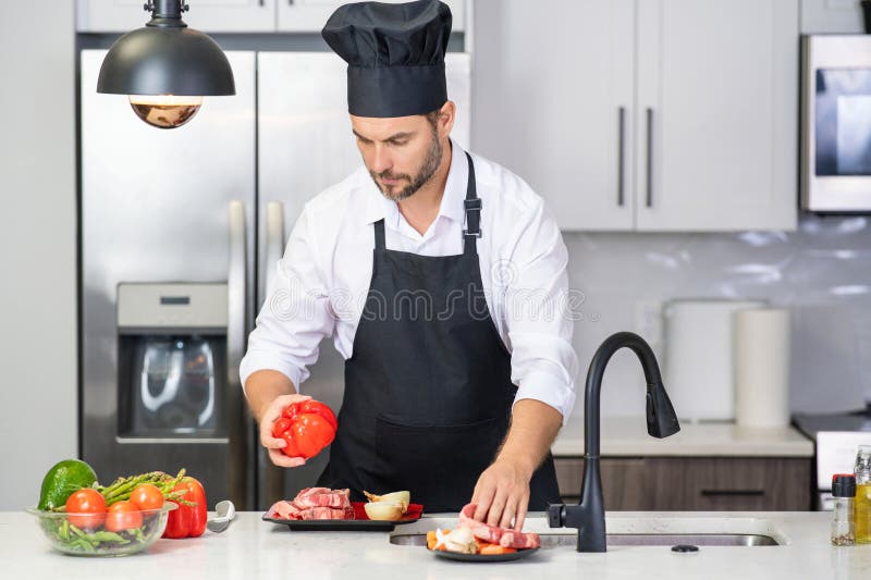Man Cooking in Modern Kitchen. Man Doing Housework at Home, Preparing ...