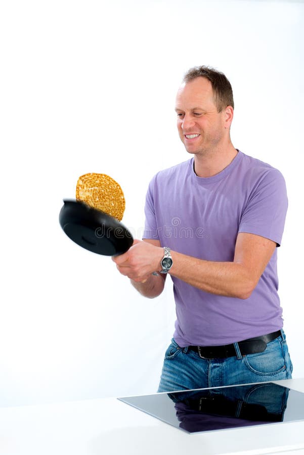 Man Cooking Pancake in the Kitchen Stock Photo - Image of morning ...