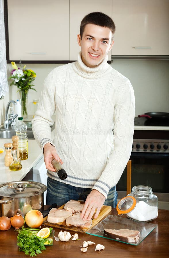 Man cooking porbeagle stock image. Image of person, interior - 43948751
