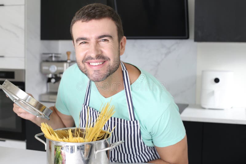 Man Cooking Spaghetti at Home Stock Image - Image of carbonara ...