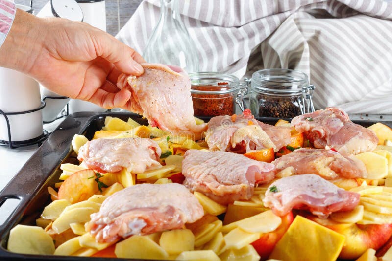 Man Cooks Chicken with Vegetables and Spices Stock Photo - Image of ...