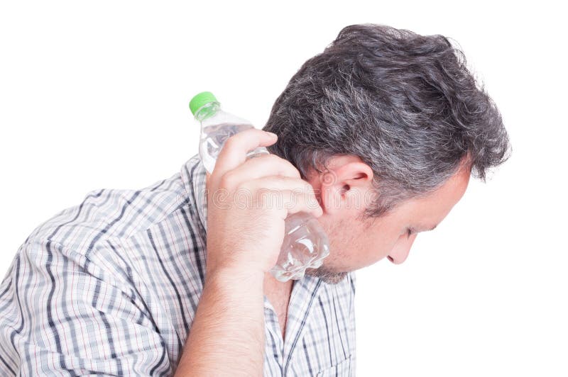 Man Cooling Down with a Bottle of Cold Water Stock Photo - Image of ...