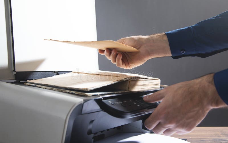 Man Copying a Book on a Copy Machine Stock Image - Image of photocopy ...