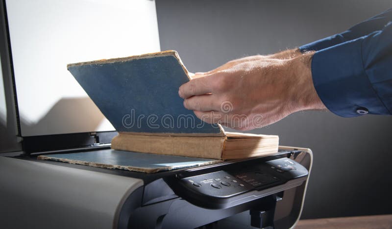 Man Copying a Book on a Copy Machine Stock Photo - Image of book ...