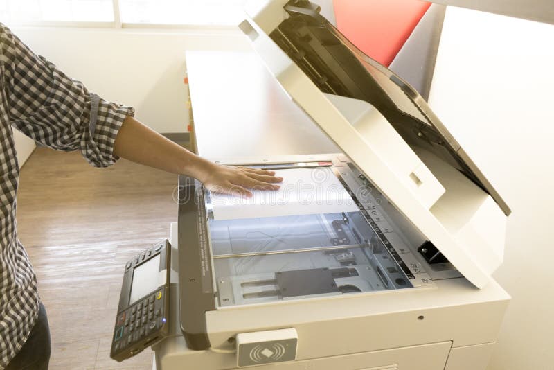Man Making Photocopy with Sheet of Paper on Photocopier with Access ...