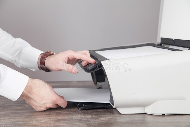 Man Copying and Scanning Documents in Office Stock Image - Image of ...