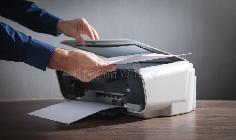 Man Copying and Scanning Documents in Office Stock Image - Image of ...