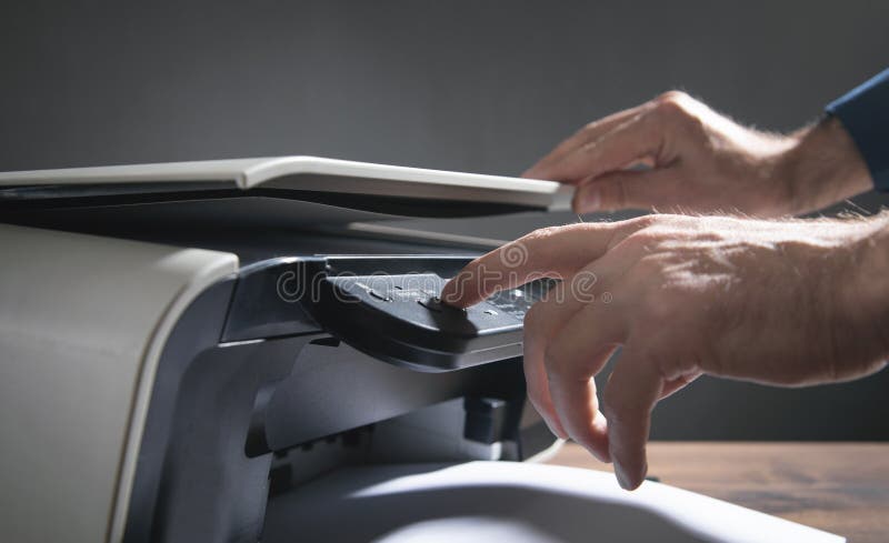 Man Copying and Scanning Documents in Office Stock Photo - Image of ...
